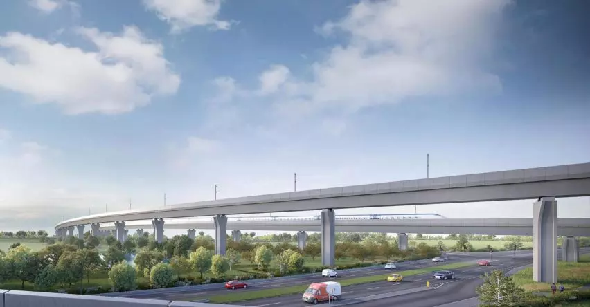 Visual jembatan kereta api yang membentang di jalan raya di Warwickshire