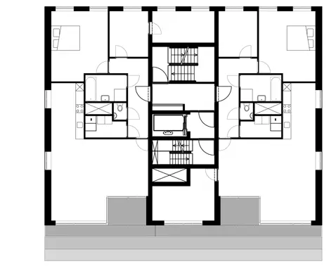 Plan douzyèm etaj nan gwo kay won Turquoise pa NL Architects ki echeye tounen pou kreye balkon solèy.