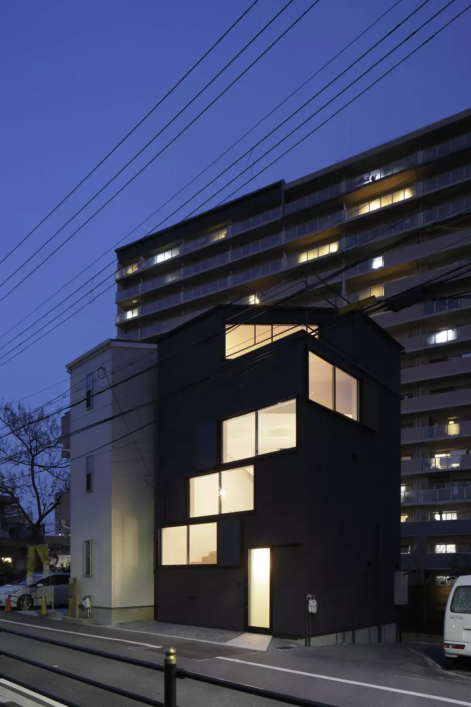 Casa cu ferestre în spirală de Alphaville Architects